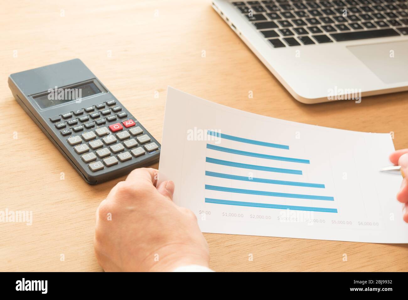 desk table with analysis chart or graph Stock Photo - Alamy