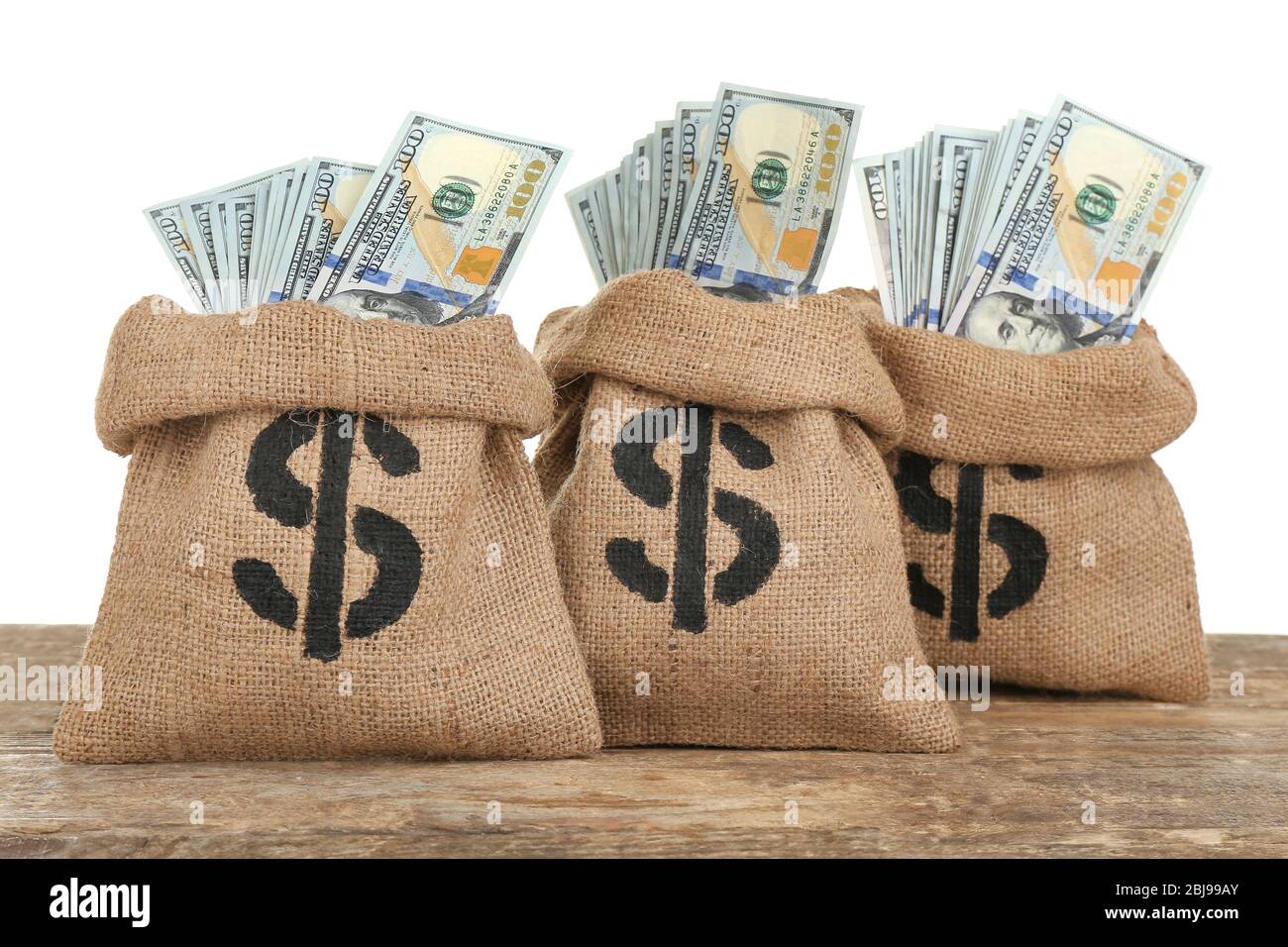 Money bags, isolated on white Stock Photo - Alamy
