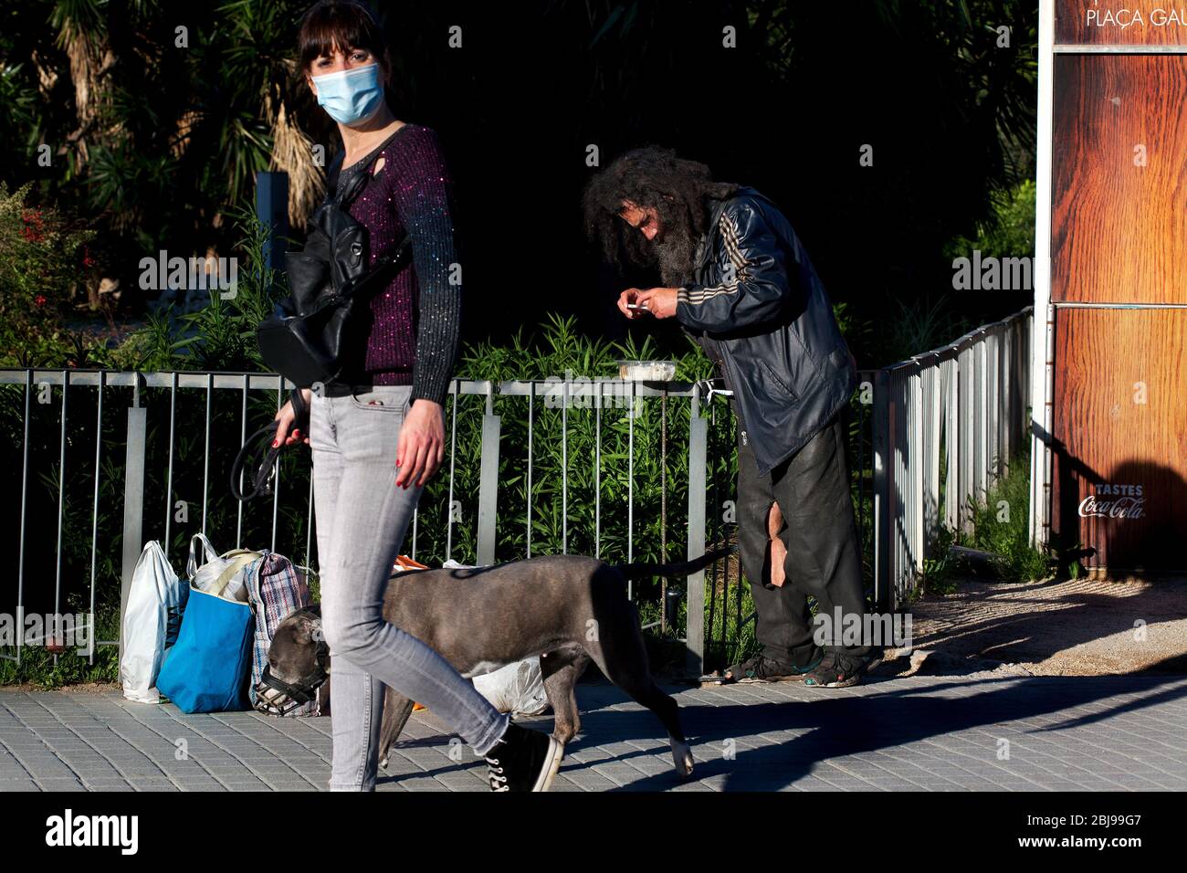 Homeless man photographs his food during lockdown in Barcelona Stock ...