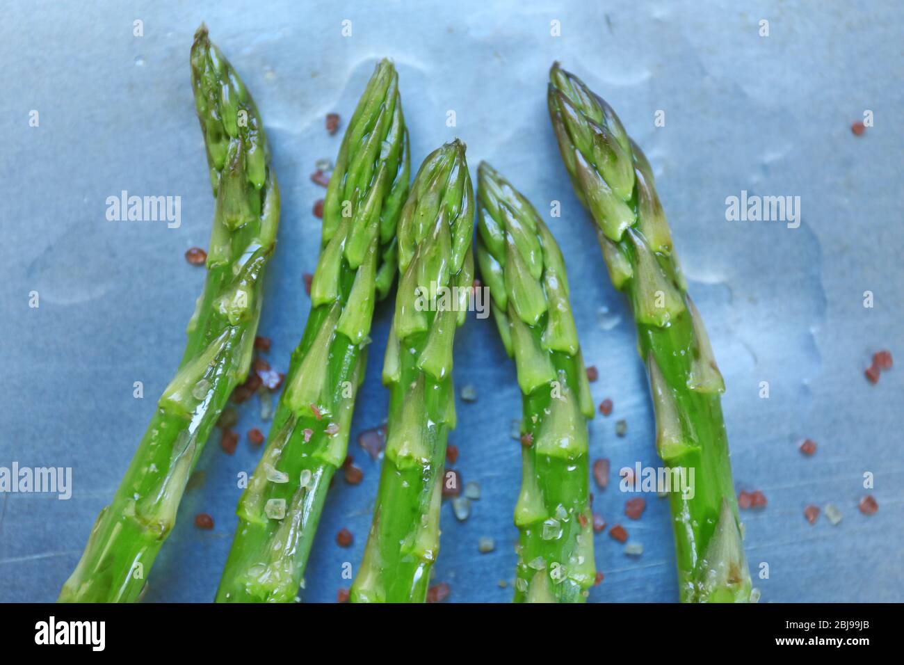 Asparagus on table Stock Photo - Alamy