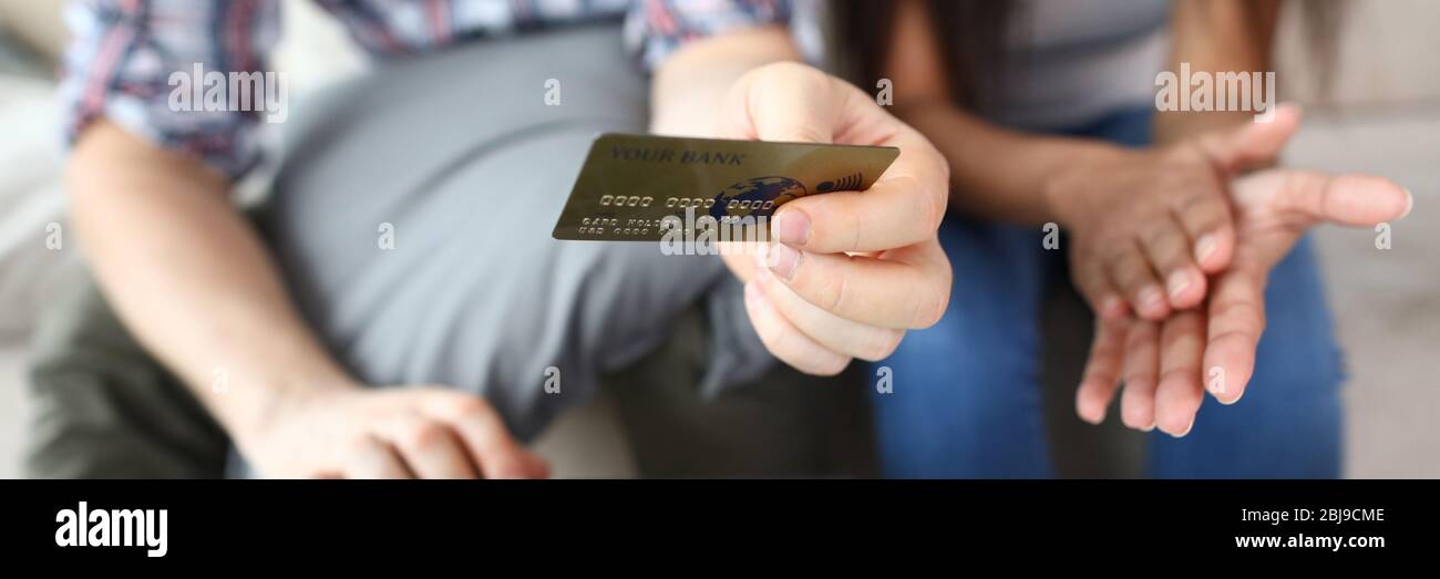 Man and woman learning how to pay via pc Stock Photo - Alamy