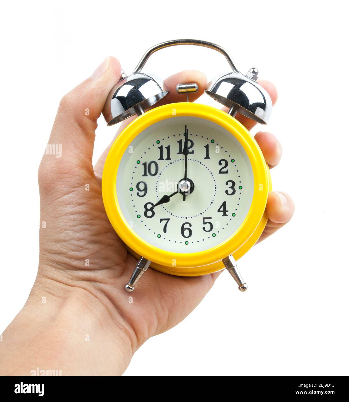 time is running classic alarm clock in a hand isolated Stock Photo - Alamy