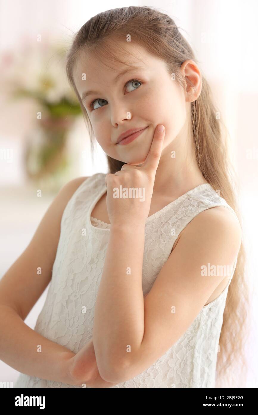 Portrait of cute small girl Stock Photo - Alamy