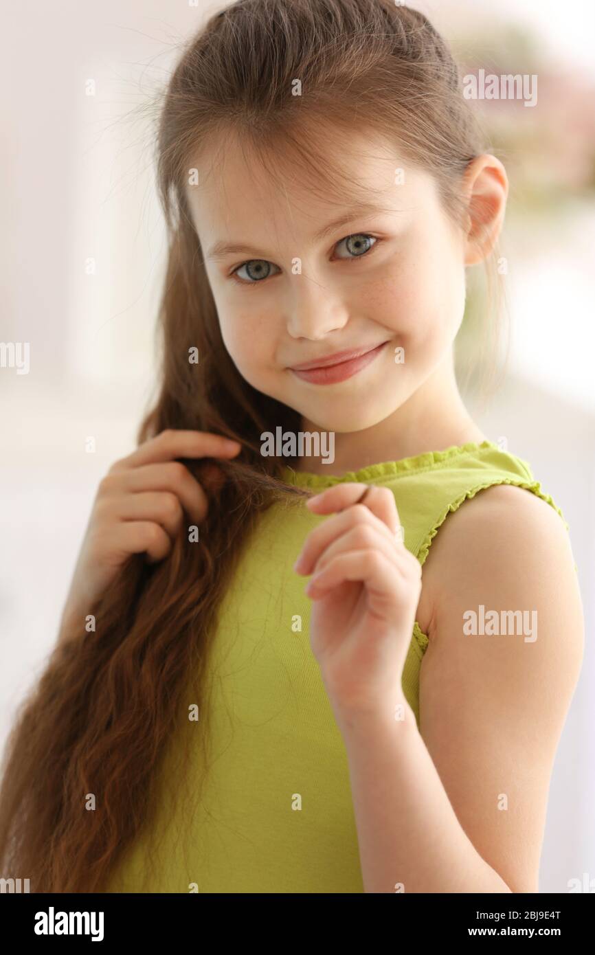 Portrait of cute small girl Stock Photo - Alamy