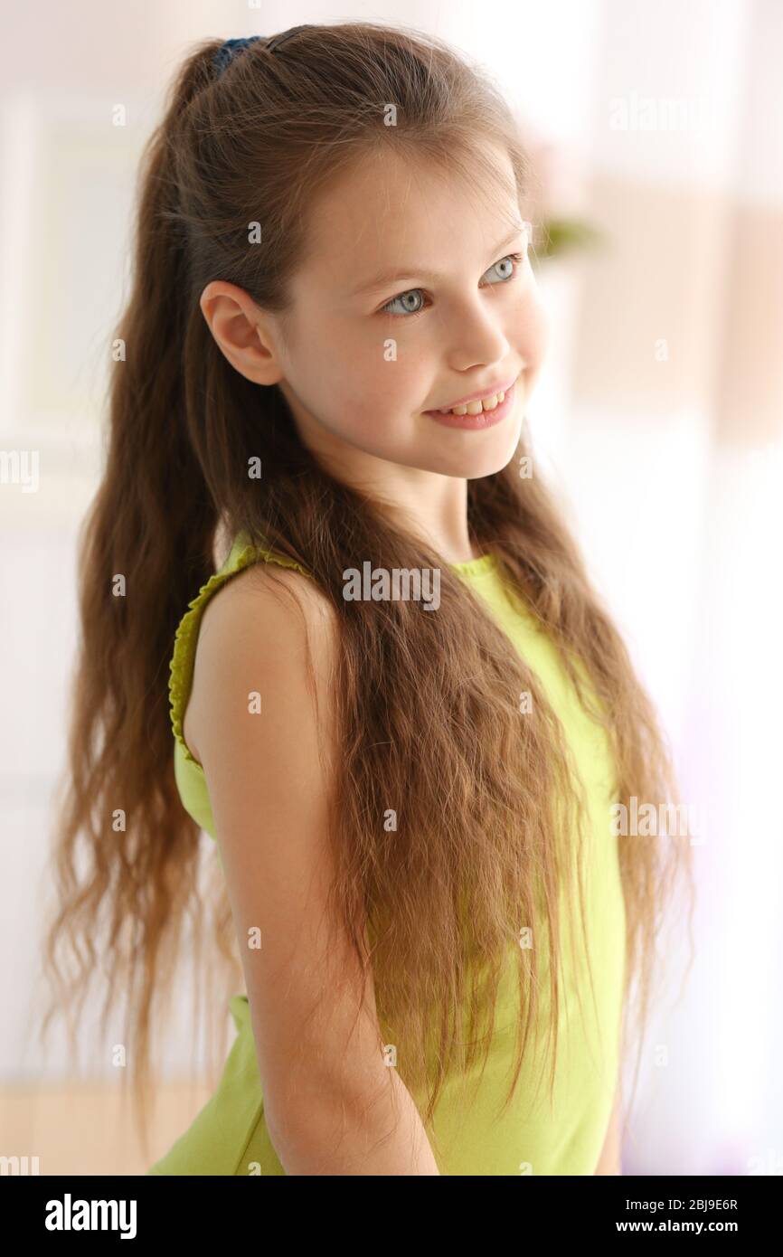 Portrait of cute small girl Stock Photo - Alamy