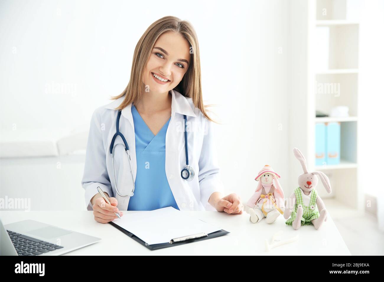Young beautiful female doctor working at the office Stock Photo - Alamy