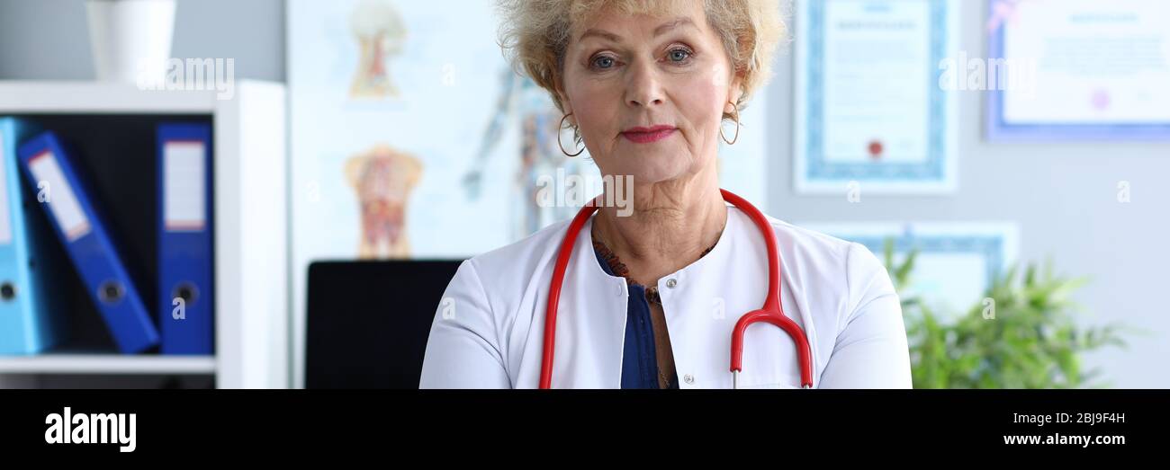 Female practitioner in cabinet Stock Photo - Alamy