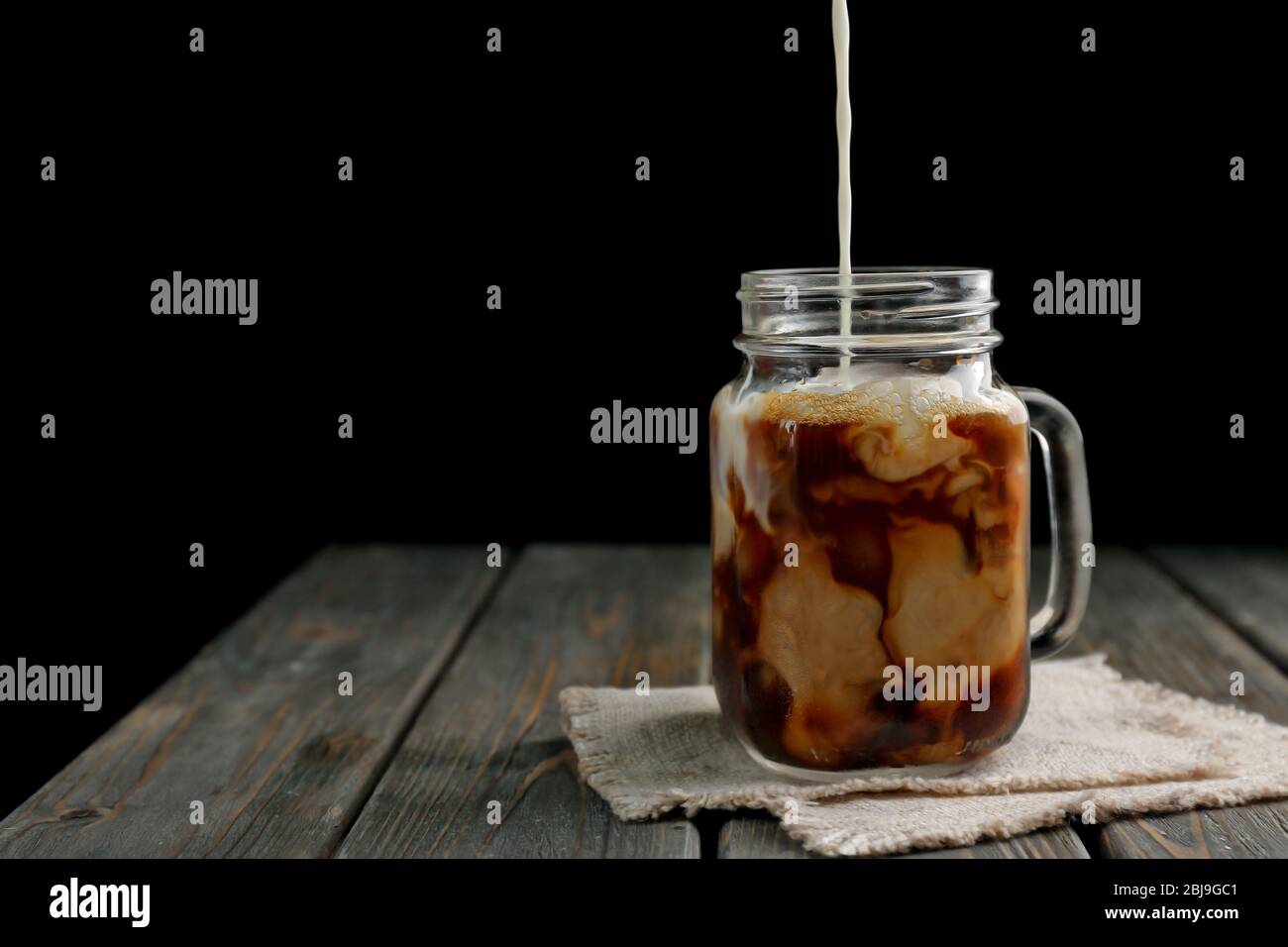Milk pouring jar iced hi-res stock photography and images - Alamy