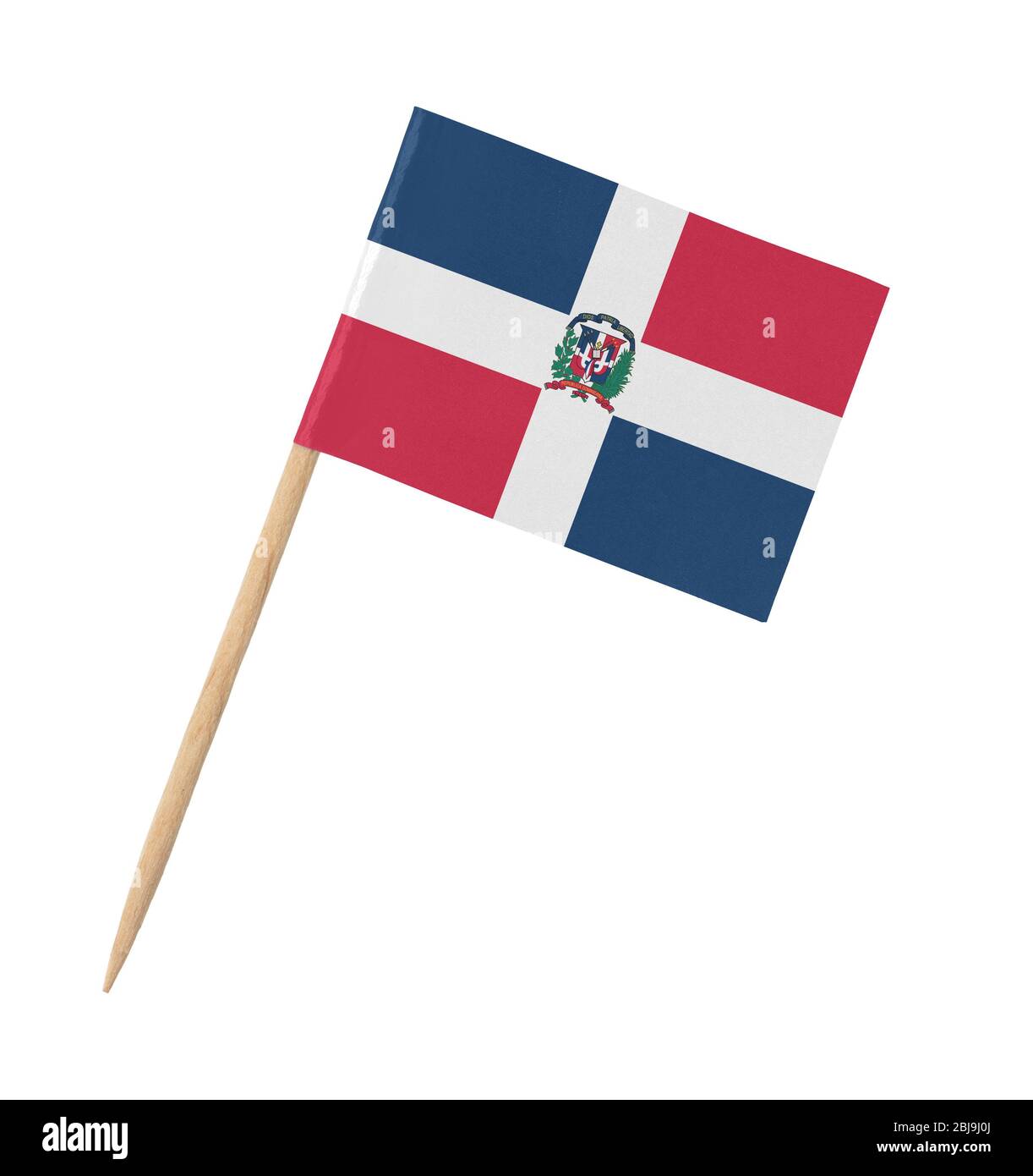 Small paper flag of Dominican Republic on wooden stick, isolated on ...