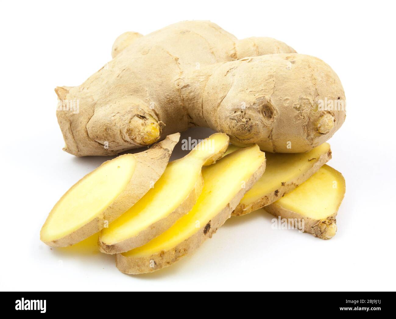 fresh ginger slide on white background Stock Photo - Alamy