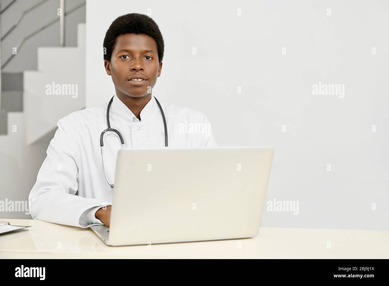 Elderly african man using computer hi-res stock photography and images ...