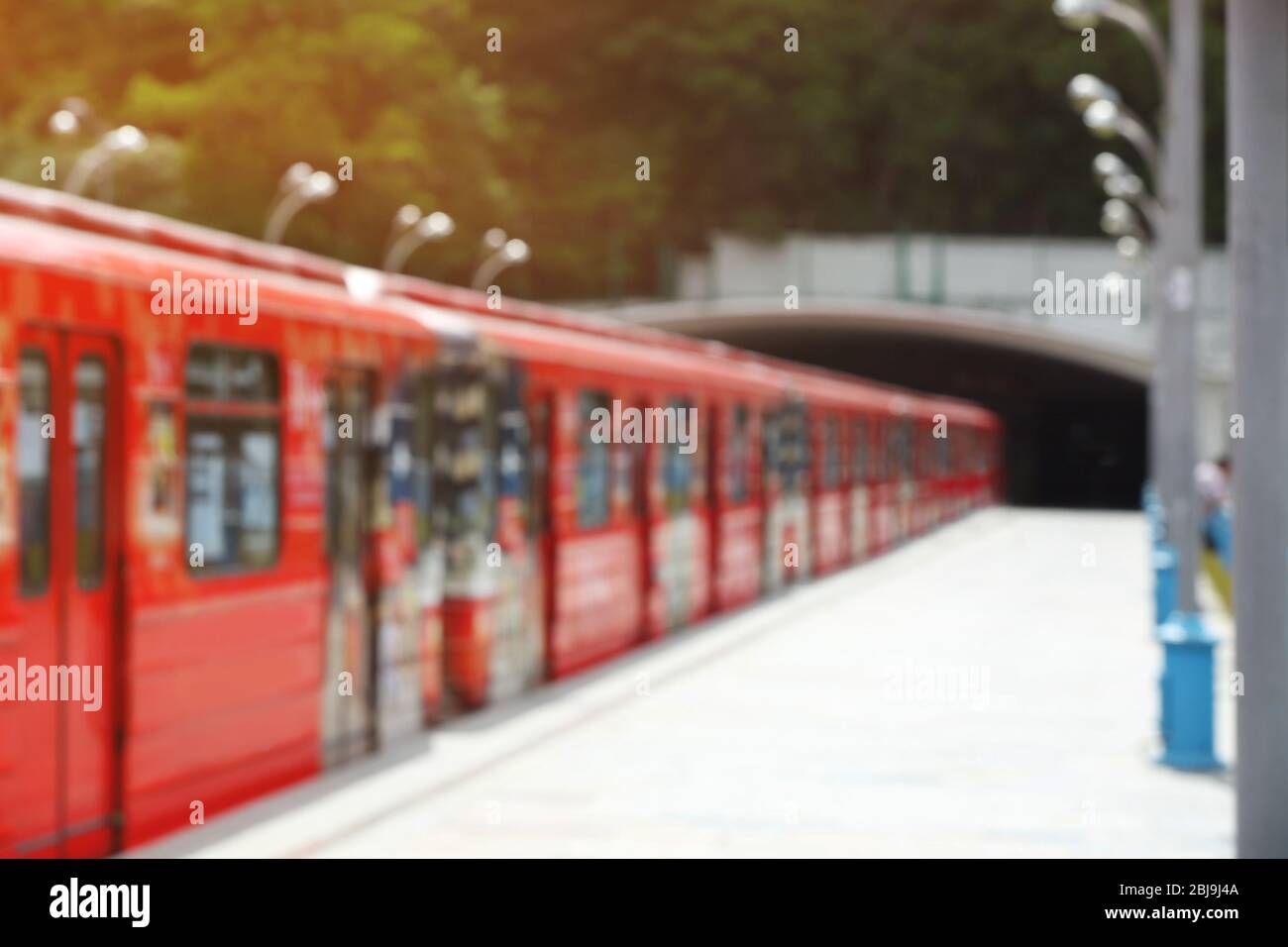 Modern bridge with subway train Stock Photo - Alamy