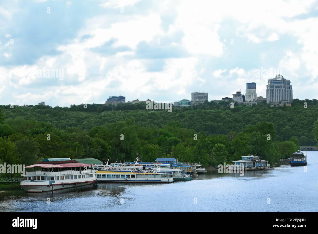 Large ships in city bay Stock Photo - Alamy