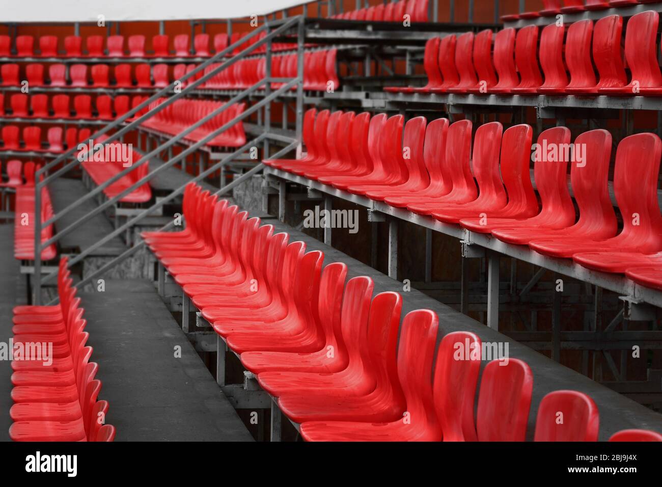 Red stadium seats Stock Photo - Alamy