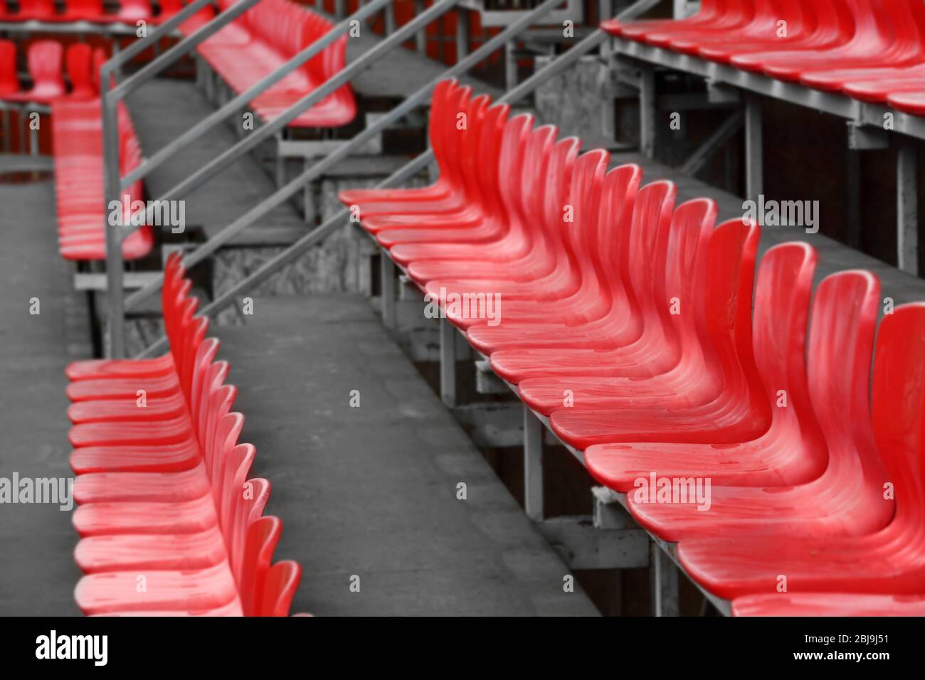 Red stadium seats Stock Photo - Alamy