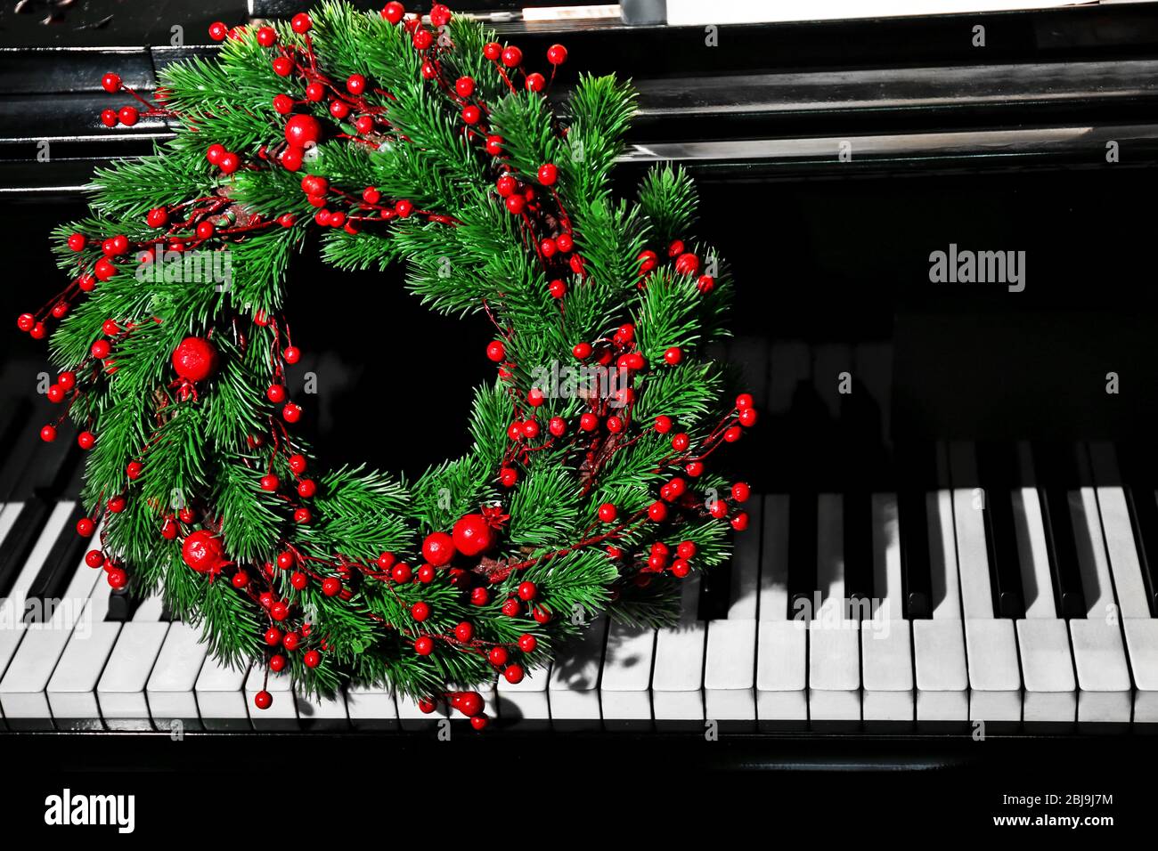 Piano keys with Christmas decorations Stock Photo - Alamy