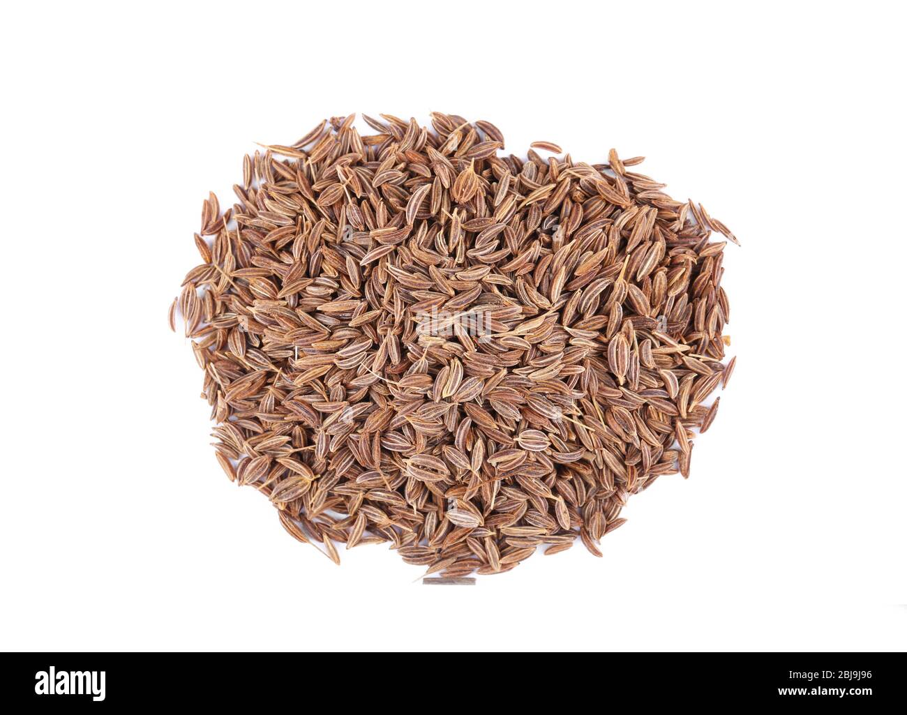 Cumin seeds isolated on white Stock Photo - Alamy