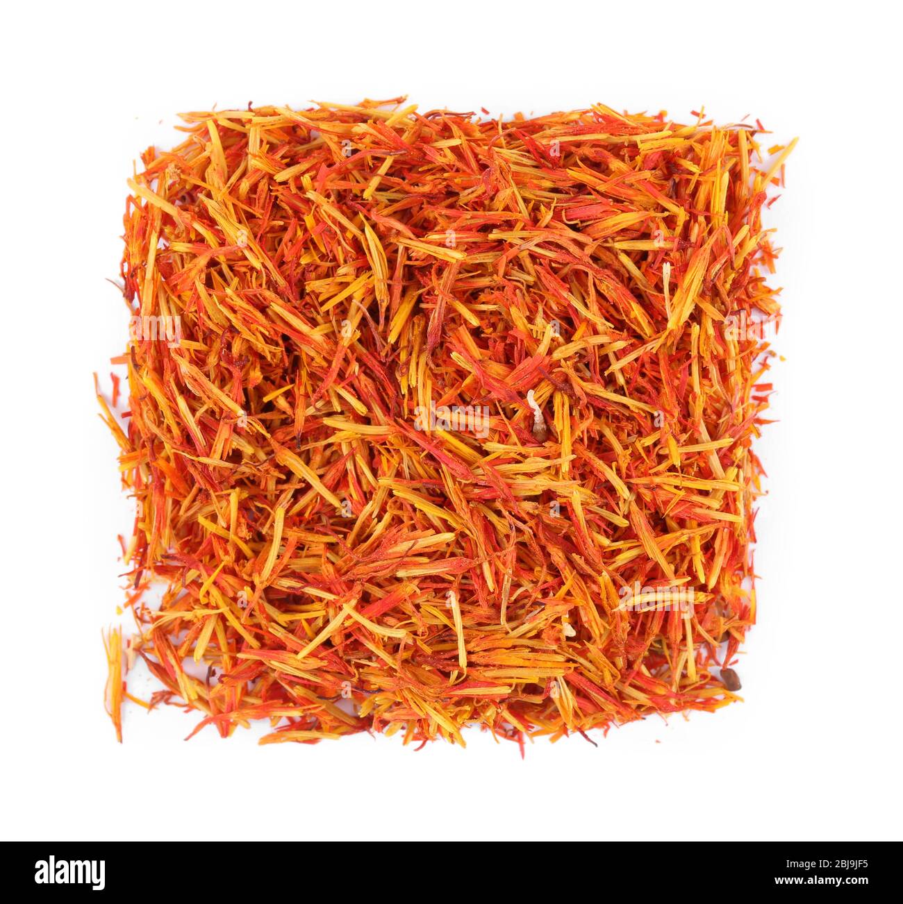 Square of dried saffron on white background Stock Photo - Alamy