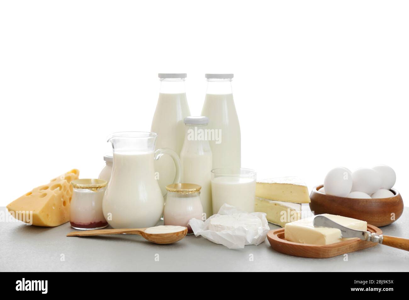 Dairy products on kitchen table Stock Photo - Alamy