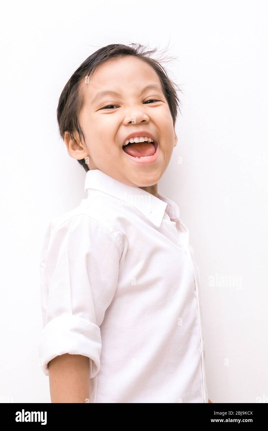 white shirt on little smart asian boy Stock Photo - Alamy