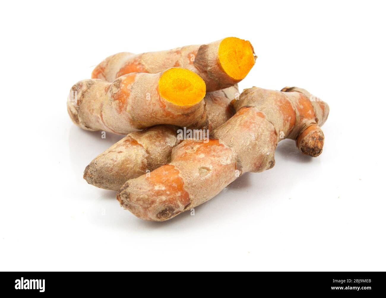 turmeric isolated on white background Stock Photo - Alamy
