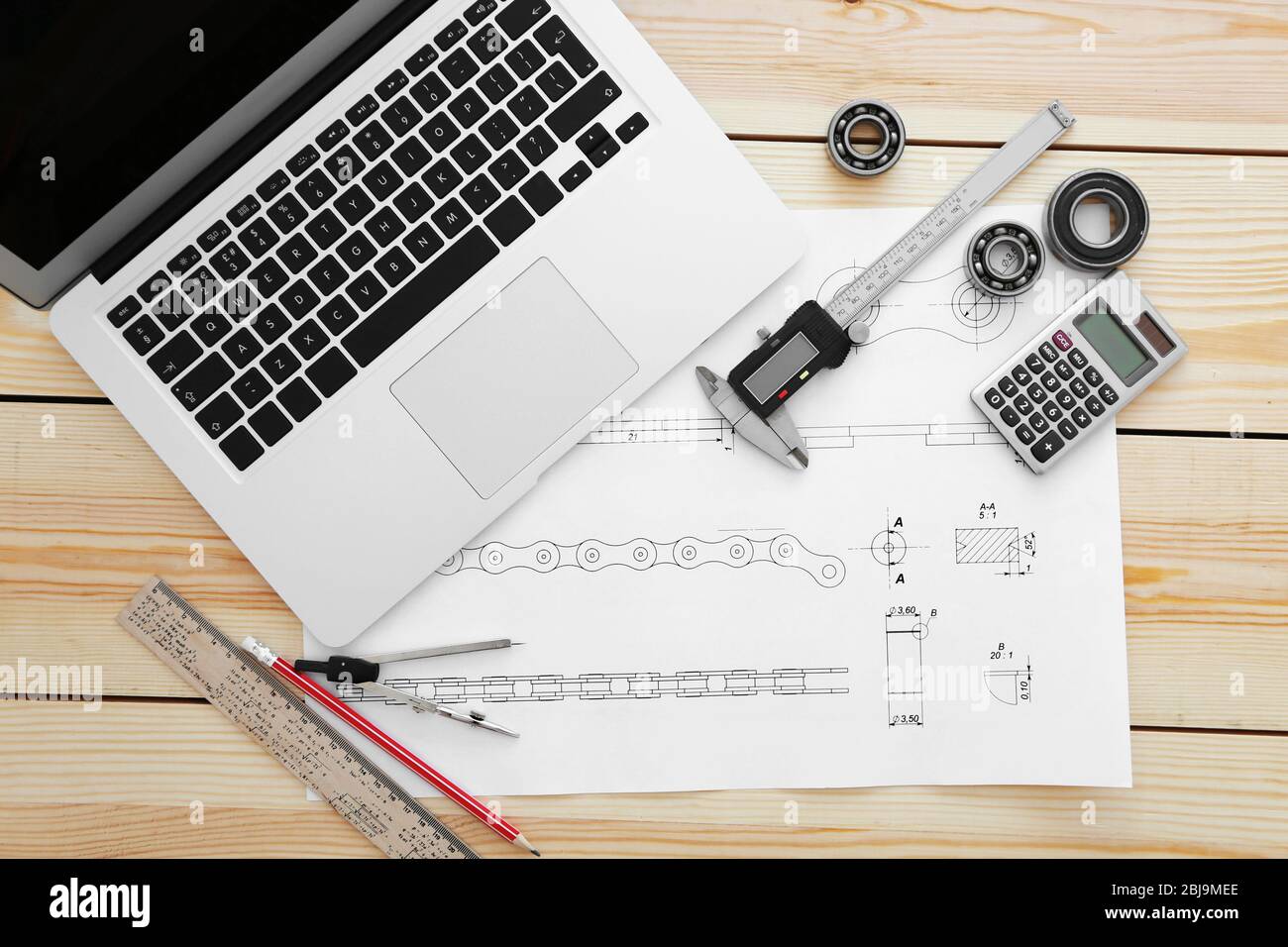 Engineering drawings of parts with tools, top view Stock Photo - Alamy
