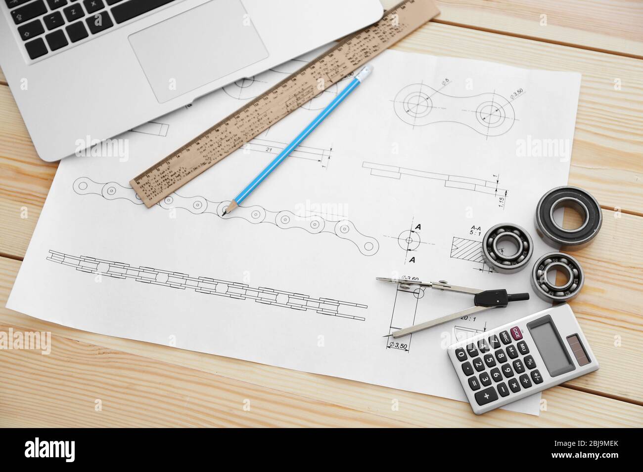 Engineering drawings of parts with tools closeup Stock Photo - Alamy
