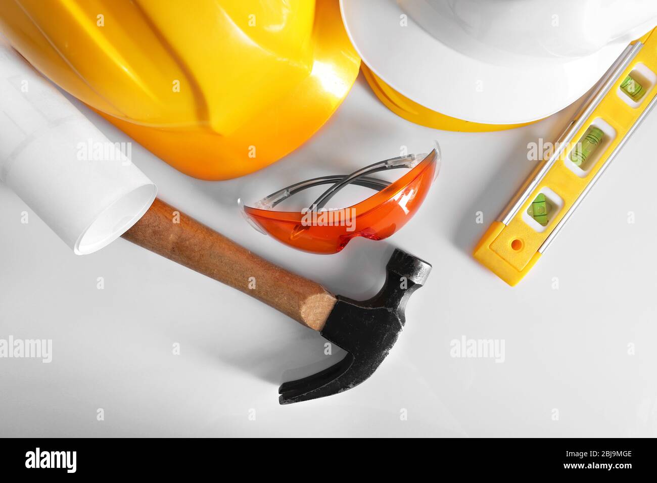 Construction tools and helmets, top view Stock Photo - Alamy