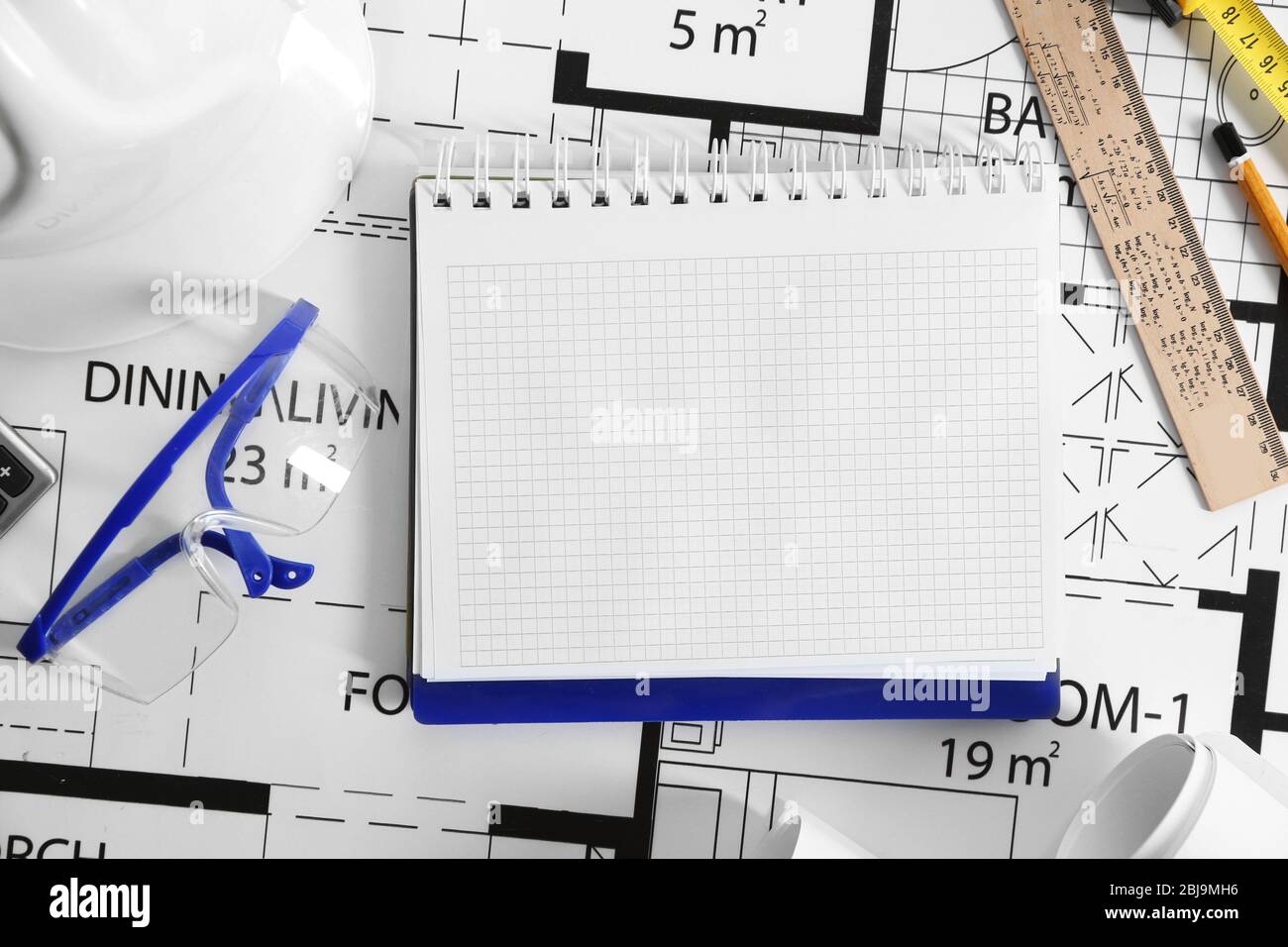 Construction drawings with tools and notebook, top view Stock Photo - Alamy
