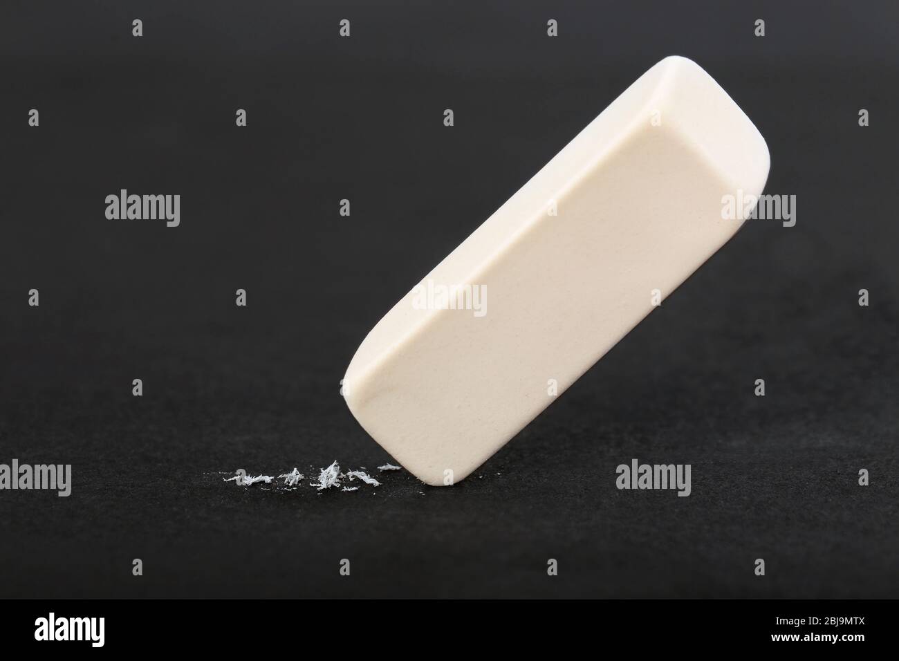 White eraser on dark background Stock Photo - Alamy