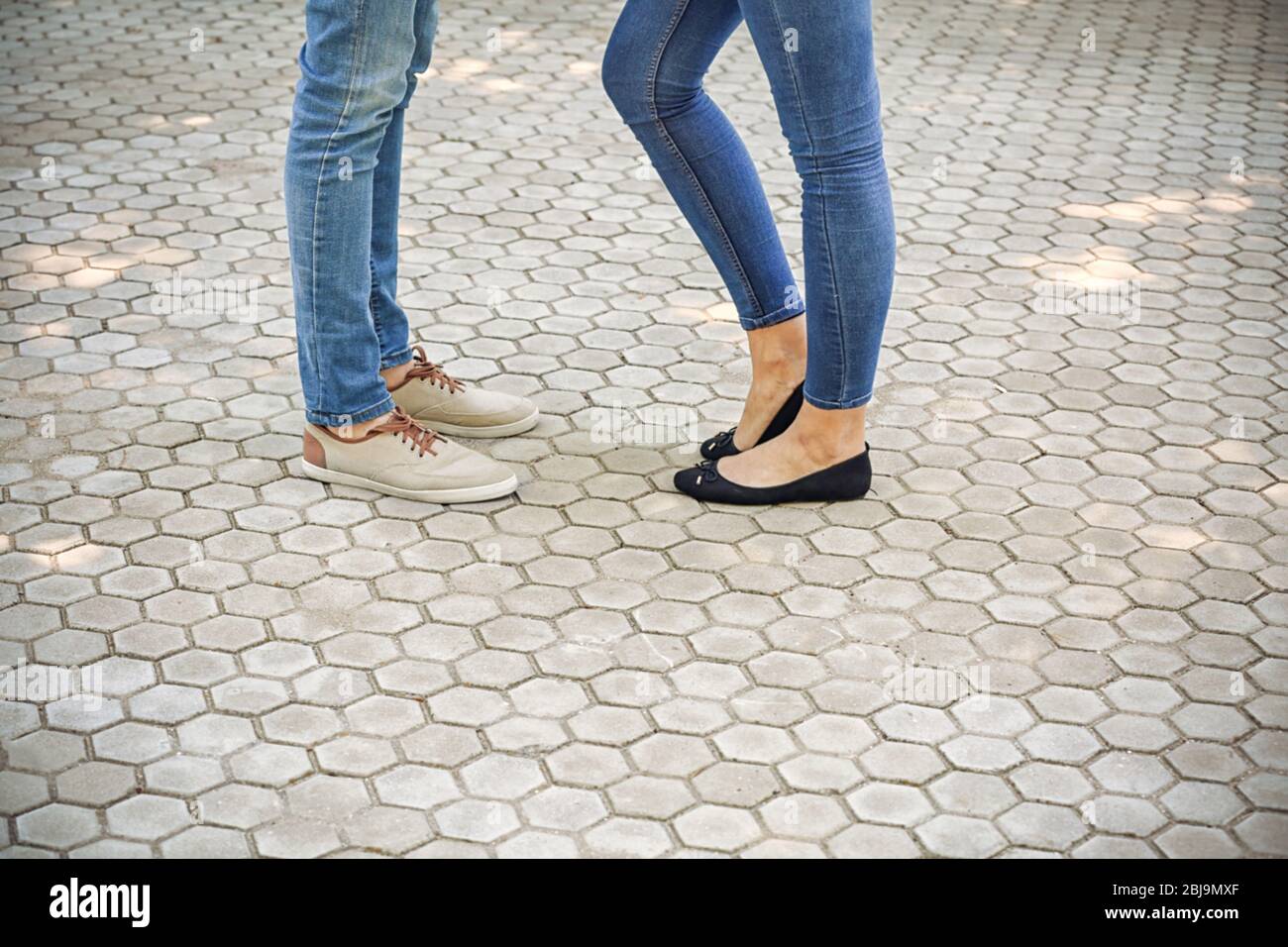 Lovely couple legs Stock Photo - Alamy