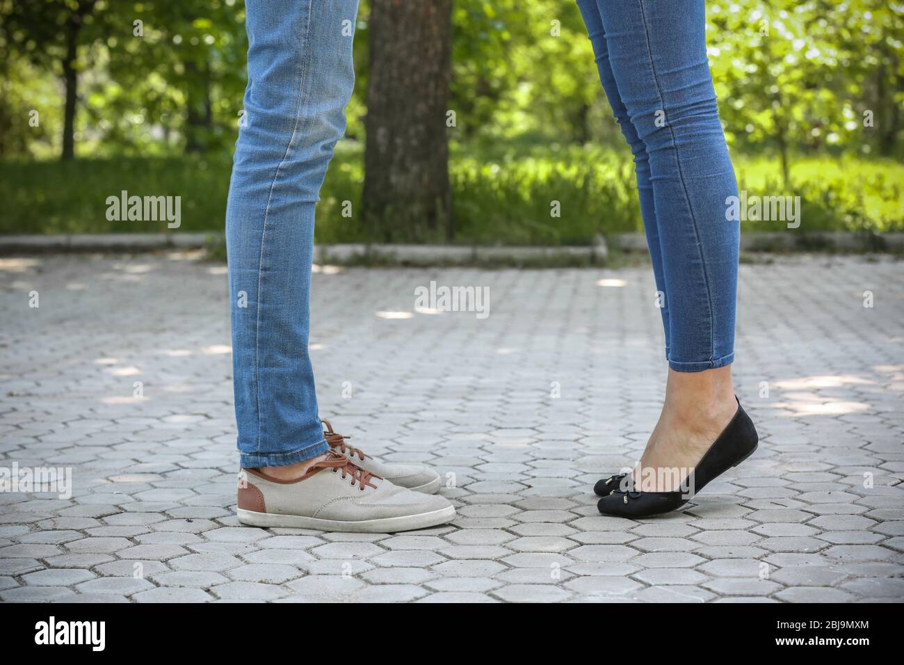 Lovely couple legs Stock Photo - Alamy