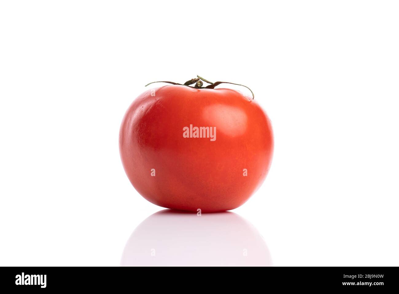 Fresh organic red tomato isolated on white background Stock Photo - Alamy