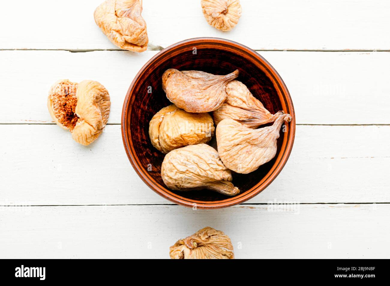 Turkish dried figs in bowl on wooden vintage background Stock Photo - Alamy