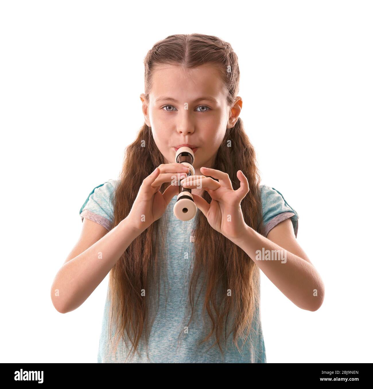 Little girl playing flute, isolated on white Stock Photo - Alamy