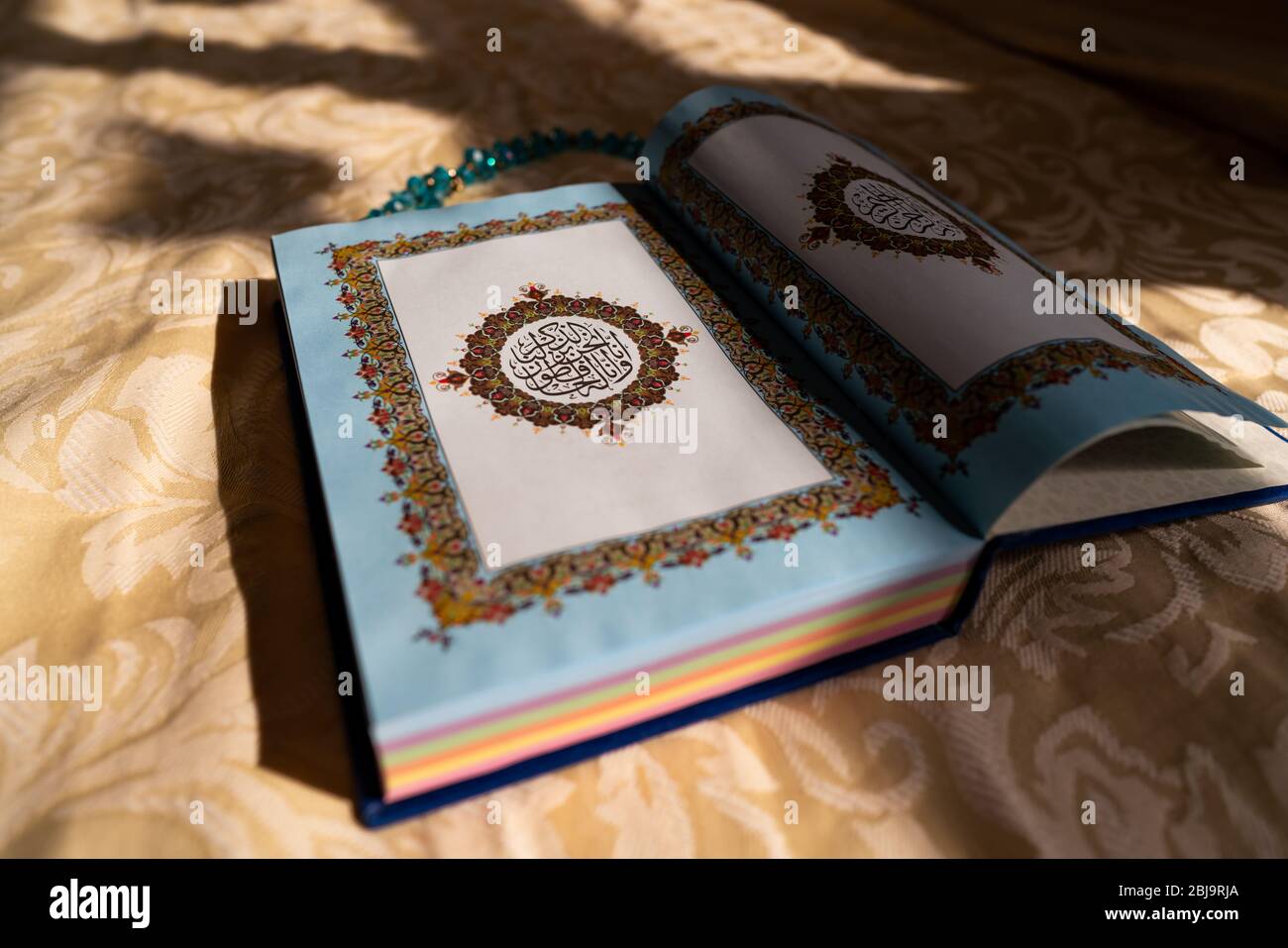 Colorful pages of the holy Quran book at sunset (Koran) | Islam ...