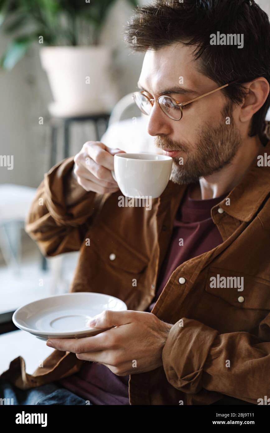 Image handsome unshaven young hi-res stock photography and images - Alamy