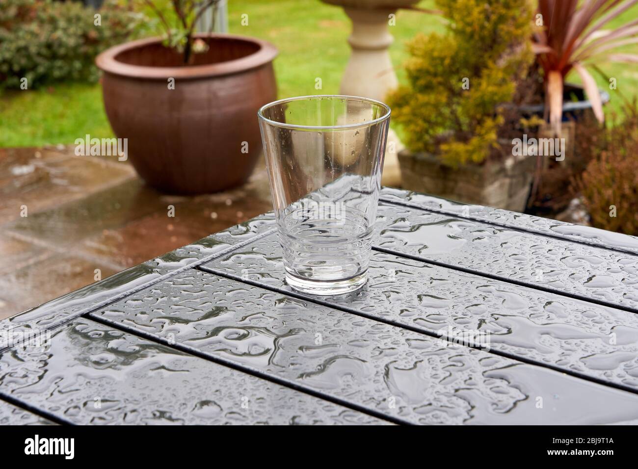 Heavy rain garden patio hi-res stock photography and images - Alamy