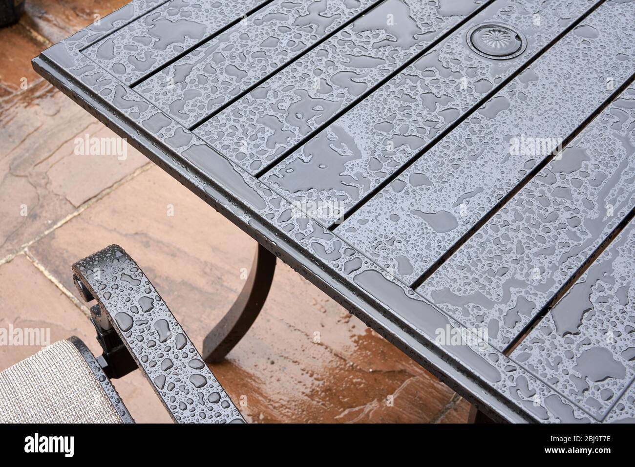 Heavy rain garden patio hi-res stock photography and images - Alamy