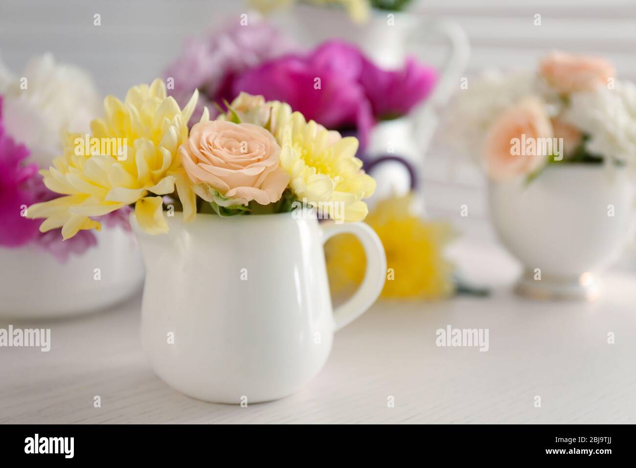 Beautiful flowers in cups hi-res stock photography and images - Alamy