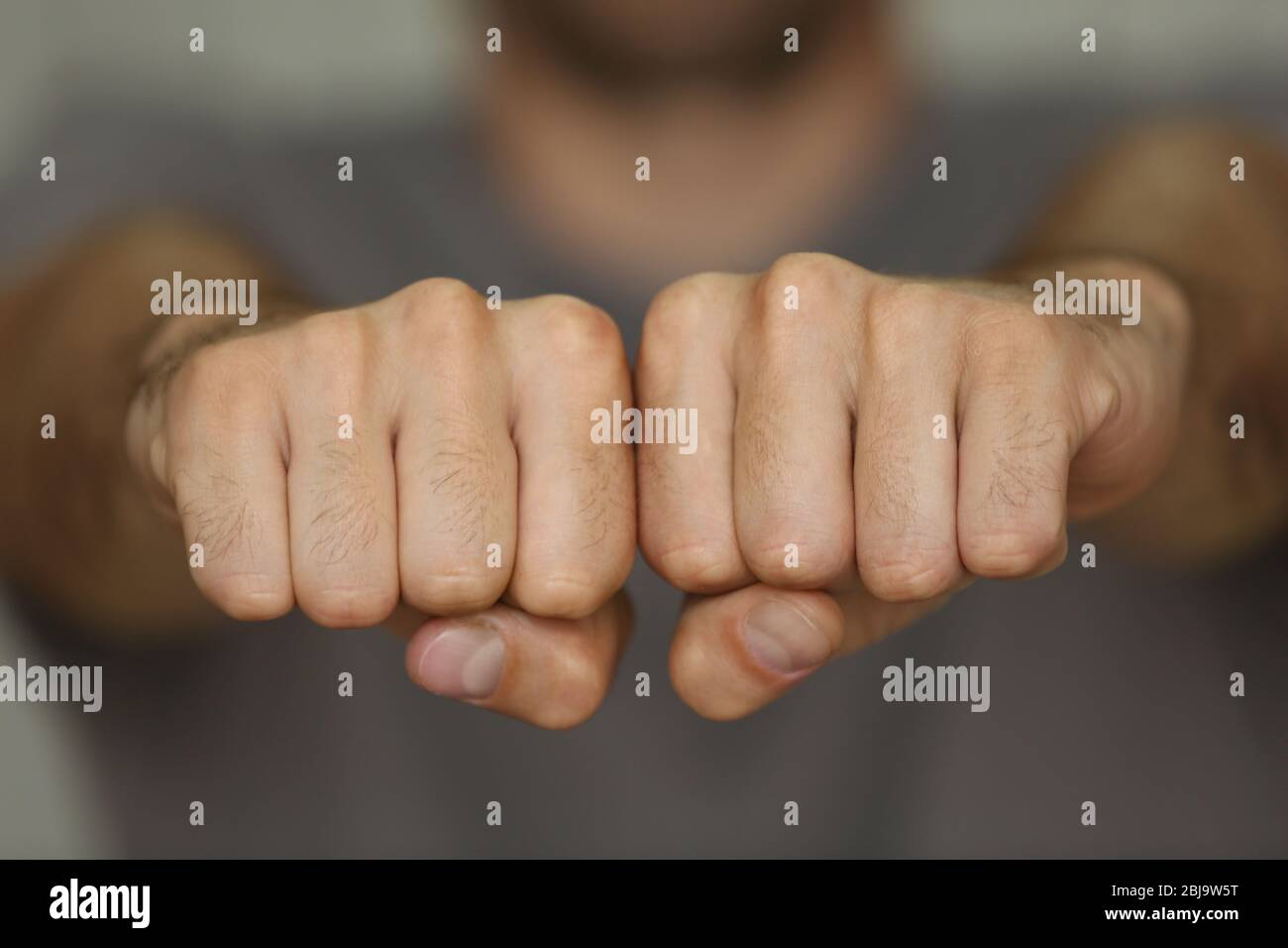 Man fists with space for tattoo Stock Photo - Alamy