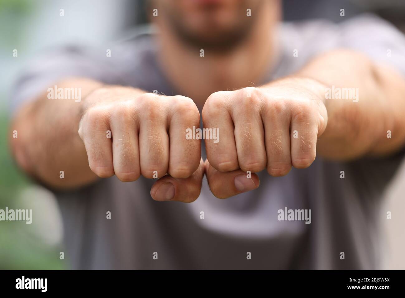 Man fists with space for tattoo Stock Photo - Alamy