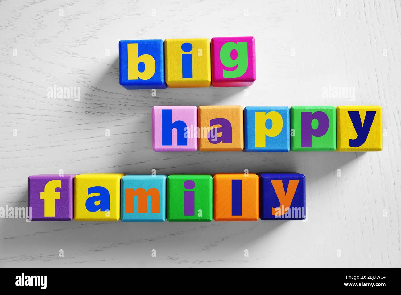 Color words BIG HAPPY FAMILY on light background Stock Photo - Alamy