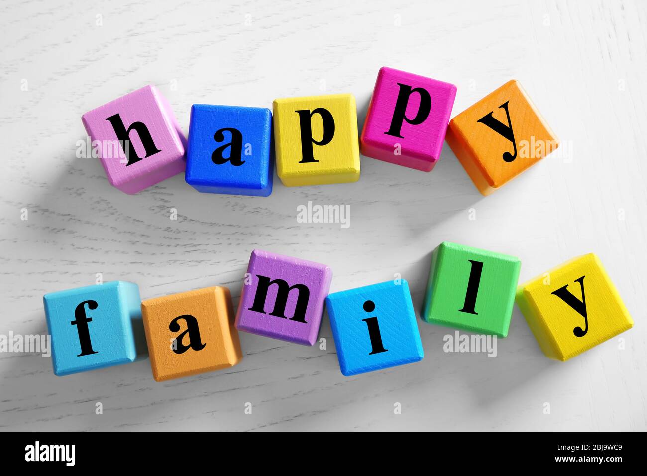 Color words HAPPY FAMILY on light background Stock Photo - Alamy