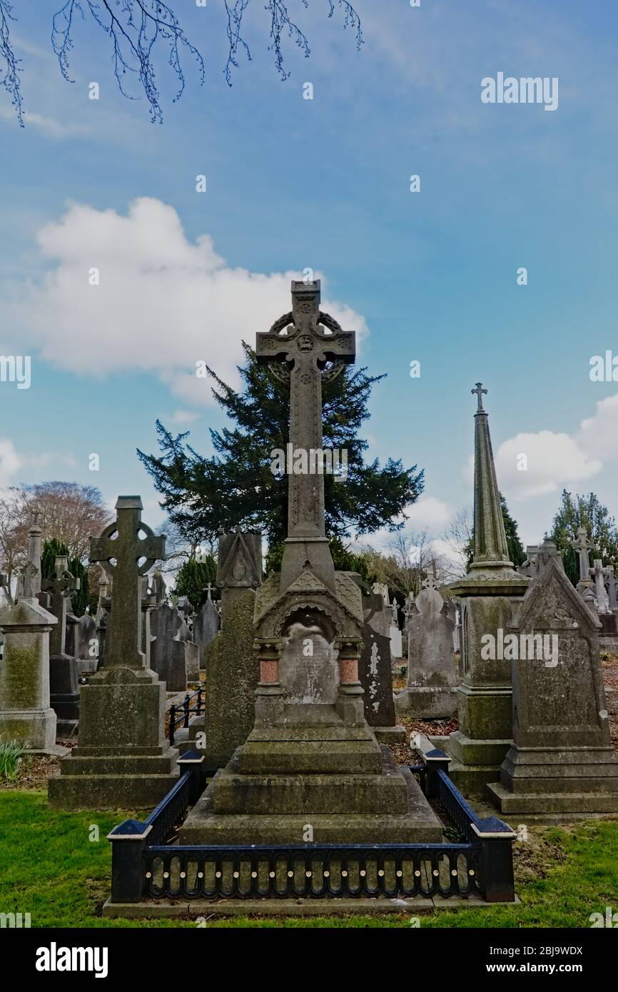 historic grave monument with celtic cross in Glasnevin cemetery, Dublin ...