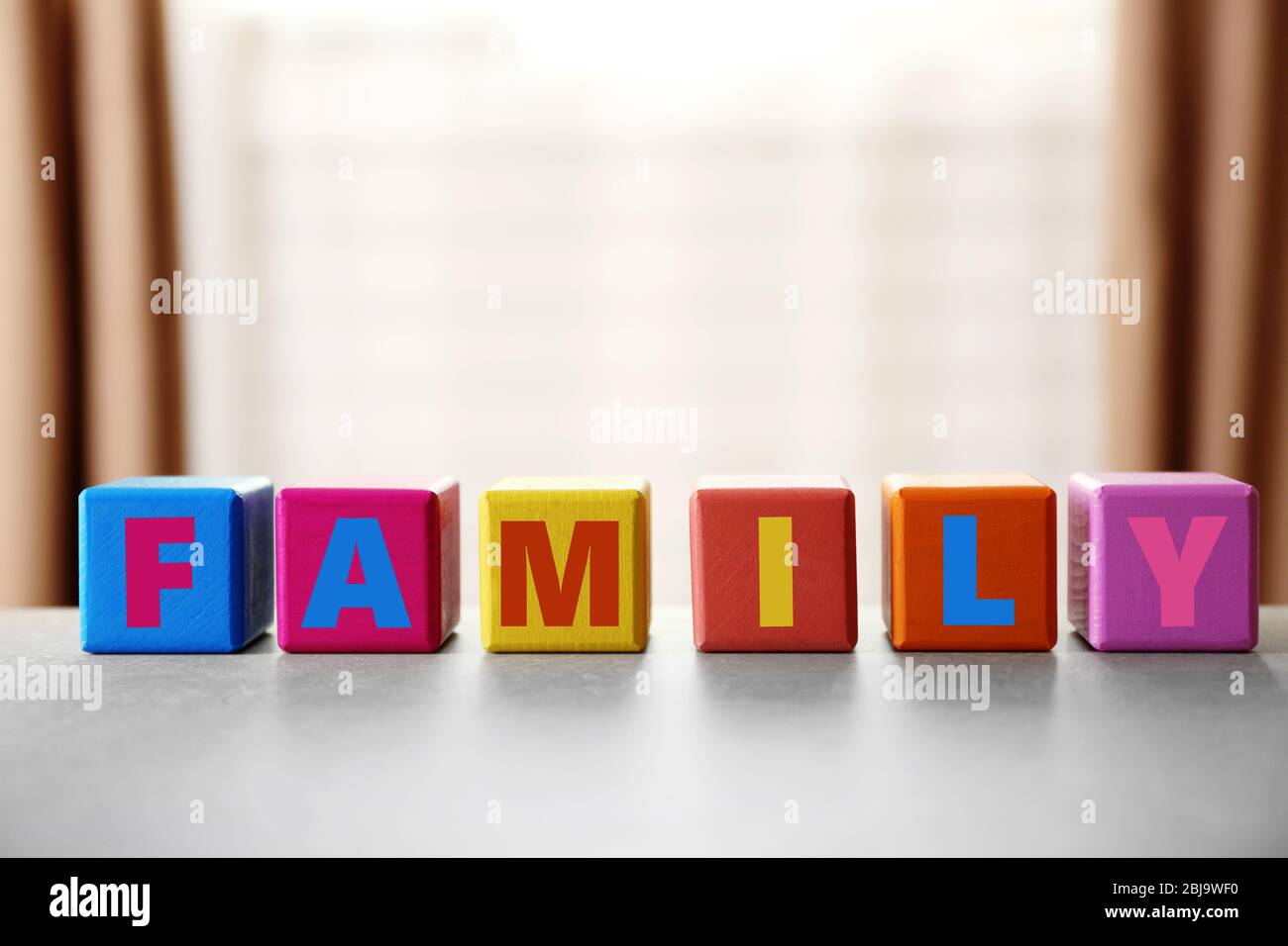 Color word FAMILY on light background Stock Photo - Alamy