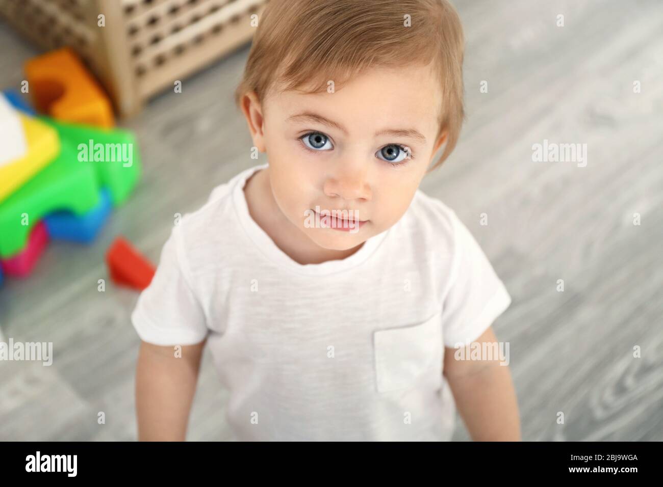 Happy cute baby girl at home Stock Photo - Alamy