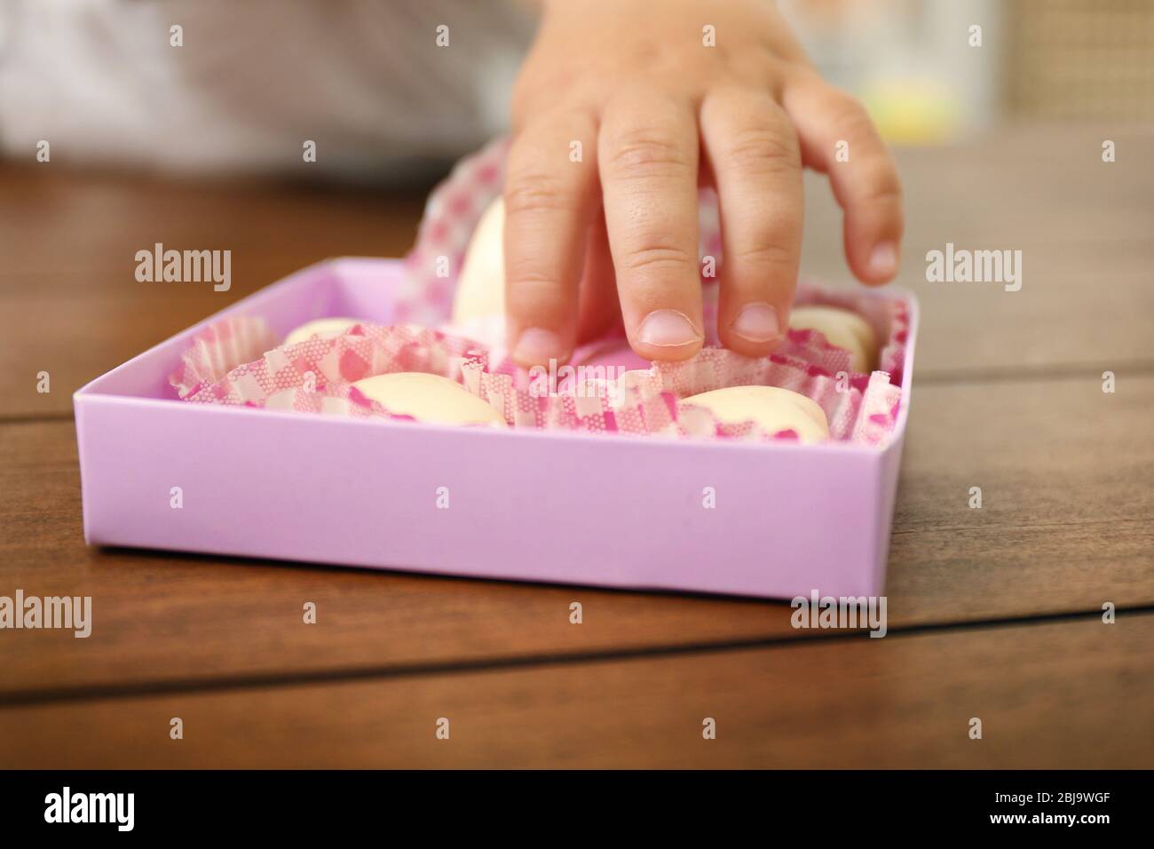 Taking candy from baby hi-res stock photography and images - Alamy