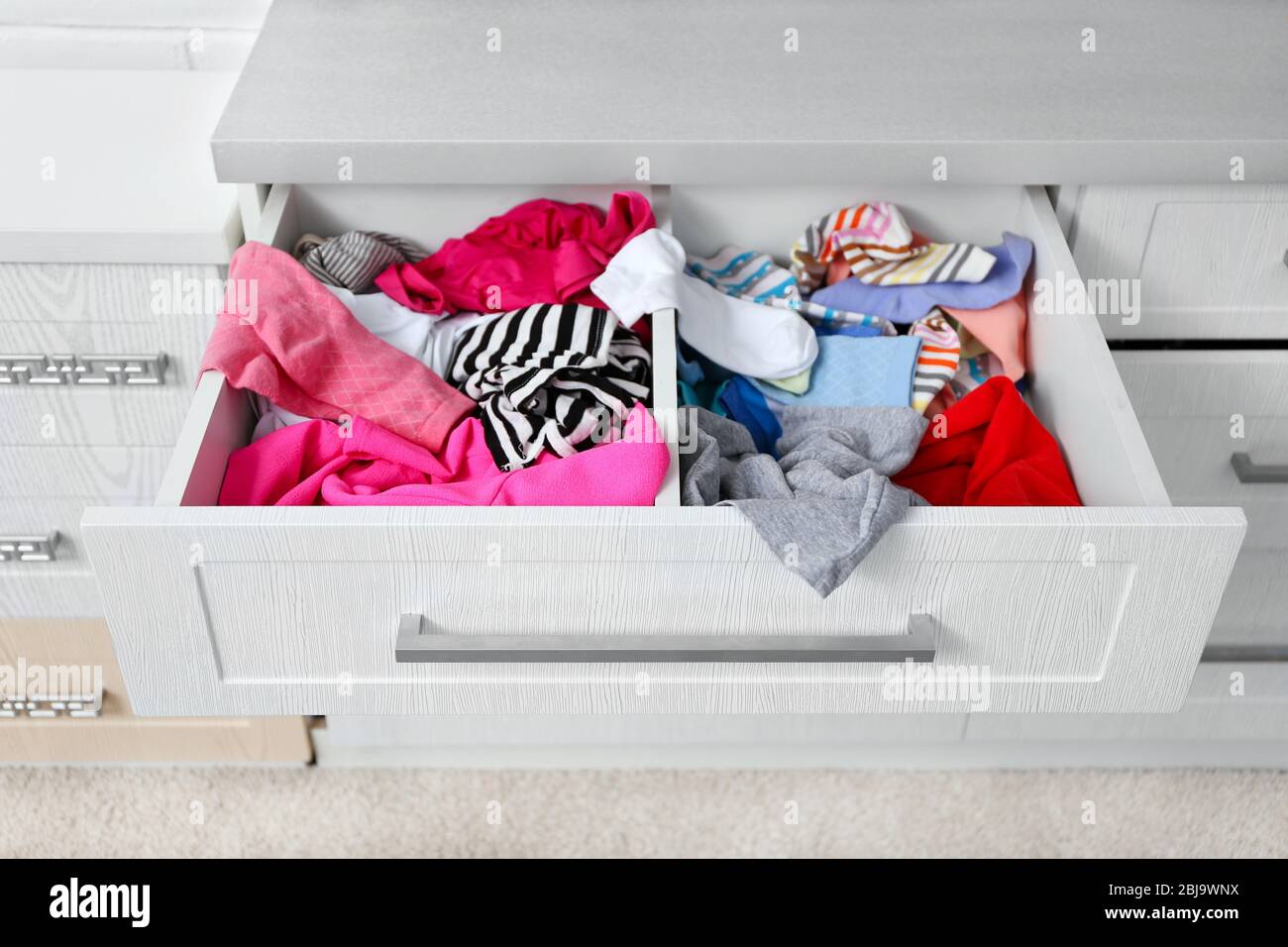 Chest of drawers clothes messy hi-res stock photography and images - Alamy