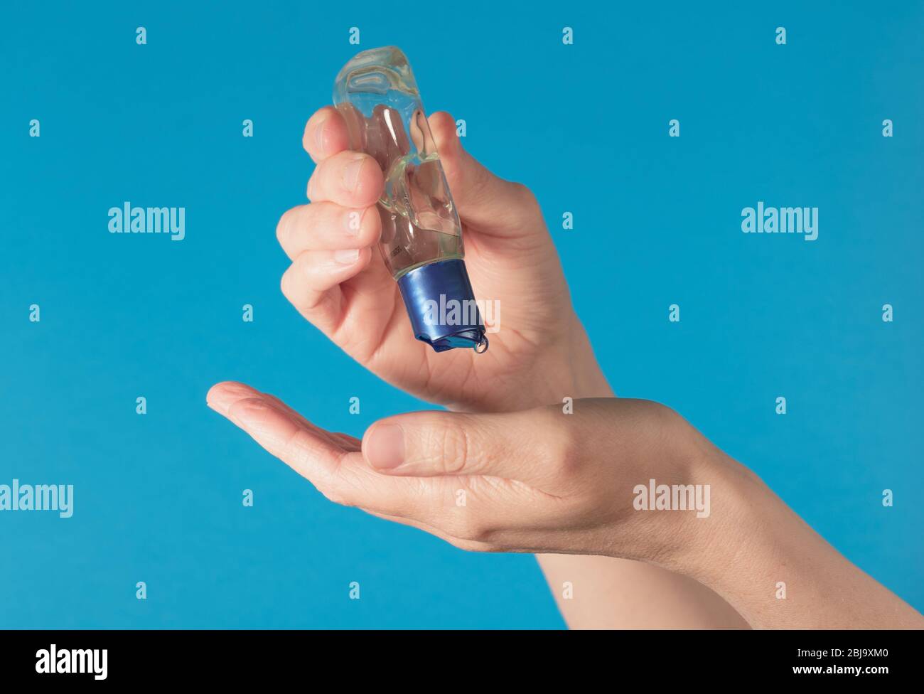 Using hand gel hi-res stock photography and images - Alamy